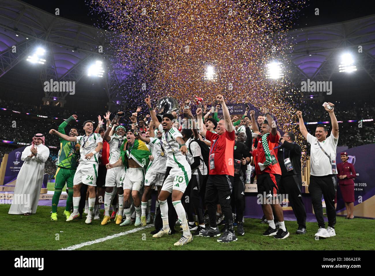 Al Ahli players celebrate with the trophy at the end of the AFC ...