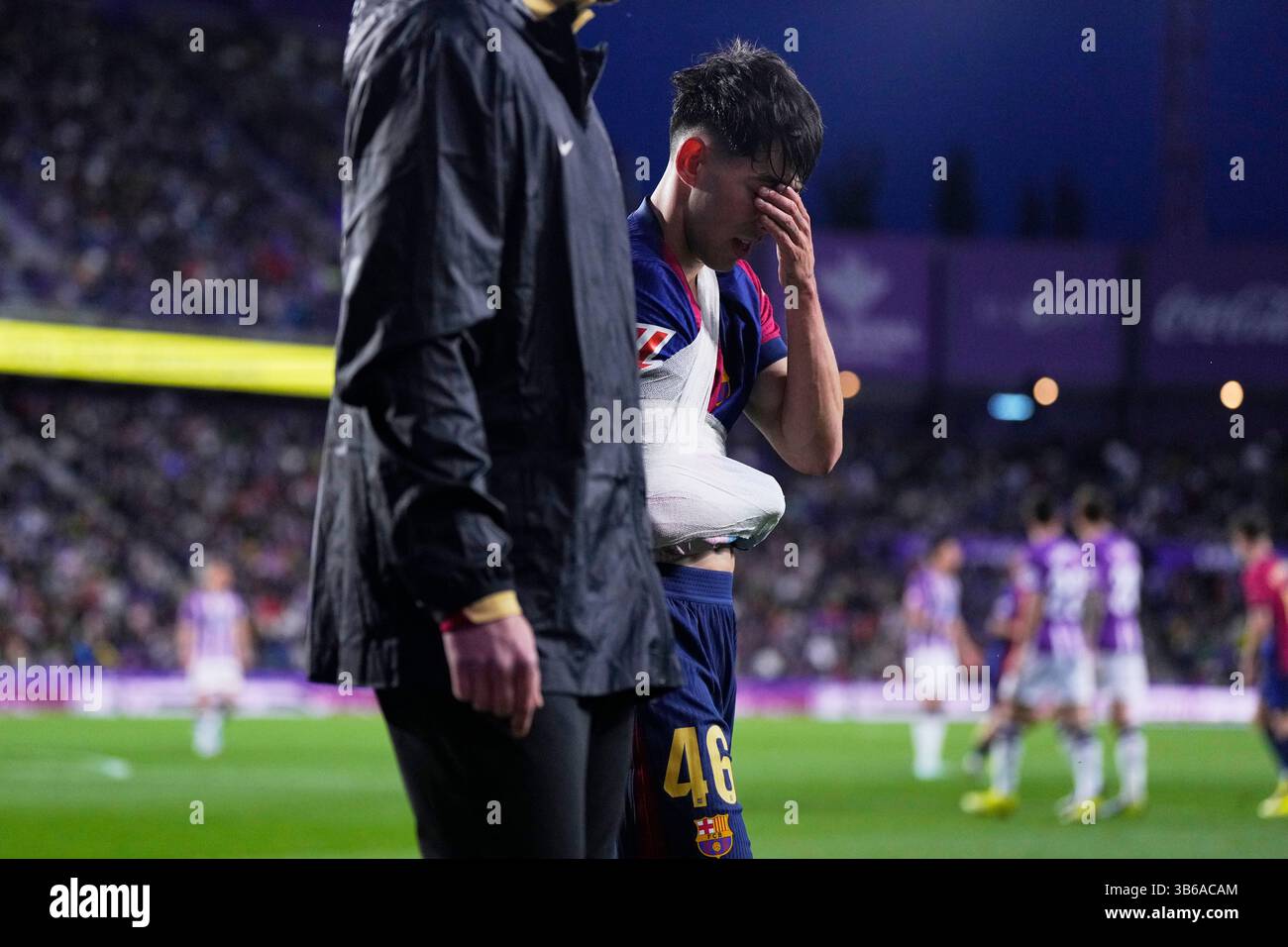 Barcelona's Dani Rodriguez leaves the pitch after an injury during the Spanish La Liga soccer ...