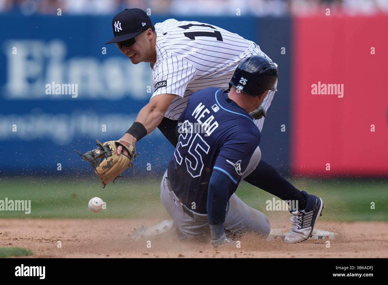 Tampa Bay Rays' Curtis Mead (25) reaches second base on a fielding ...