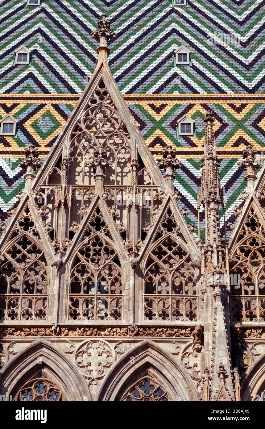Gothic decoration and the colourful patterned tile roof of the landmark ...