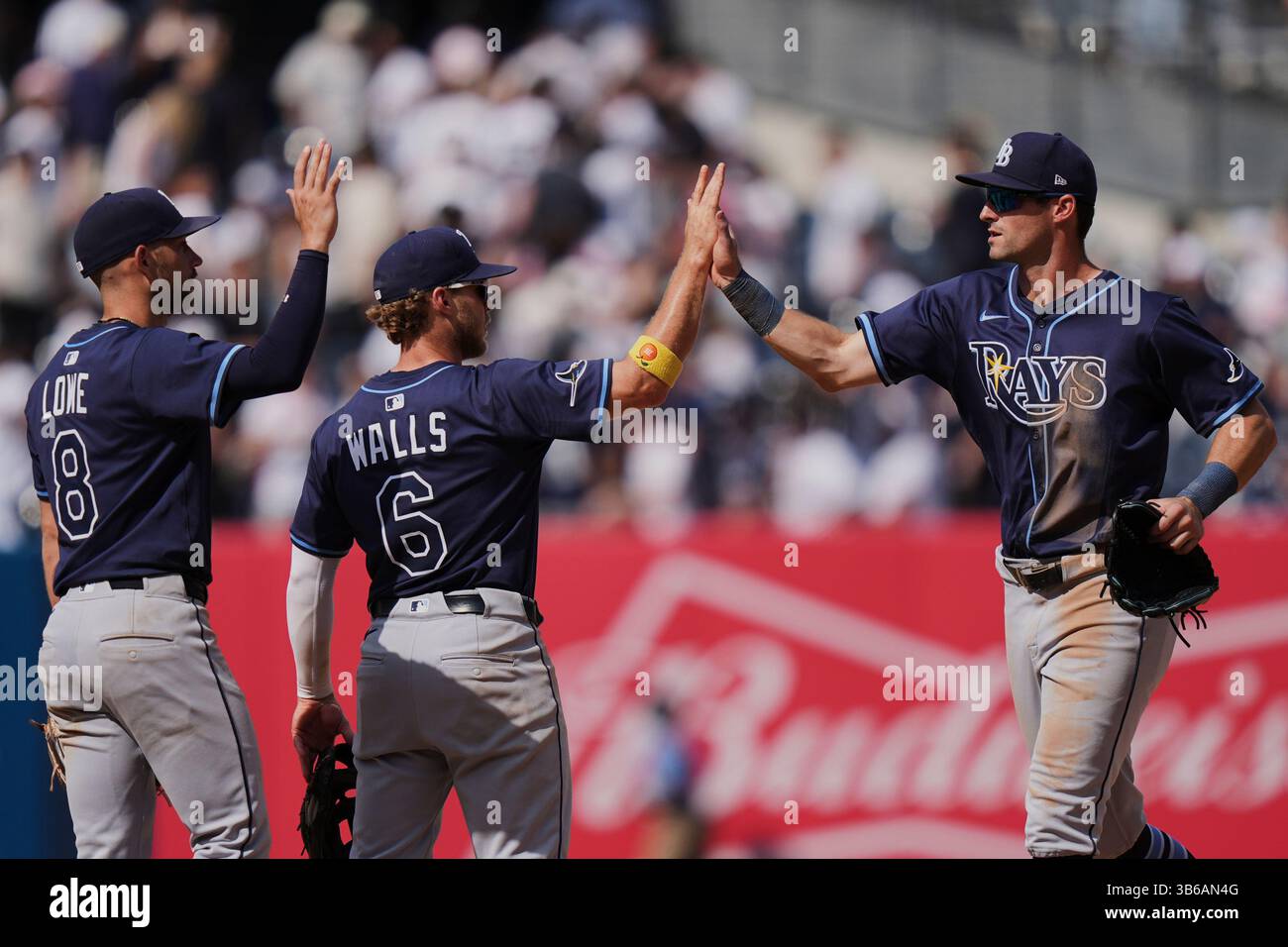 Tampa Bay Rays' Kameron Misner, right, celebrates with Taylor Walls (6 ...