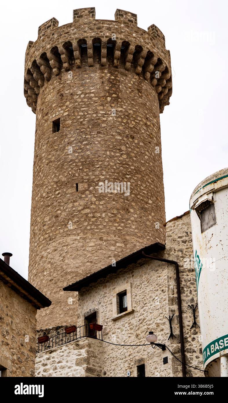 A historic stone tower with a cylindrical shape and crenellated top ...