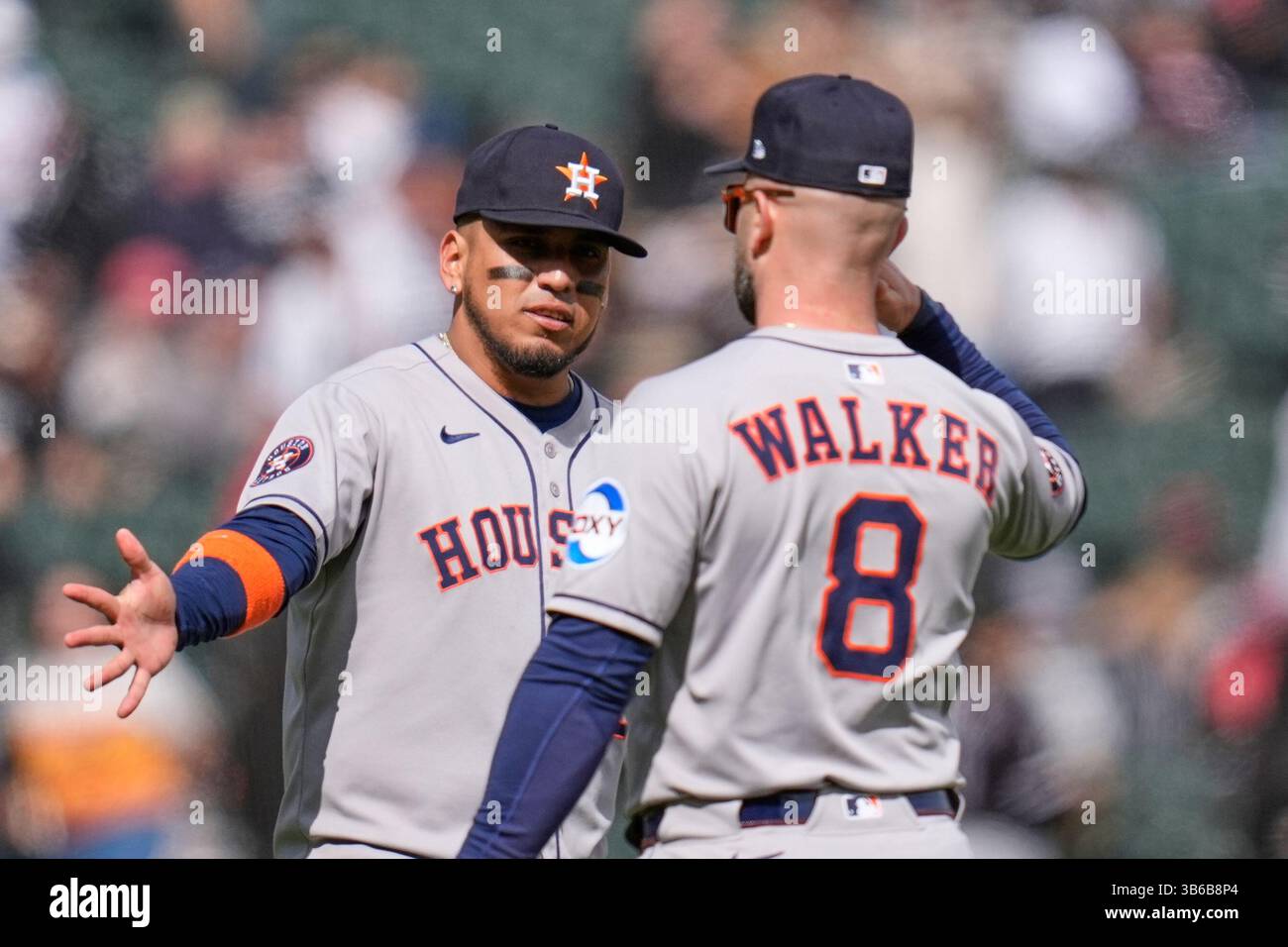 Houston Astros' Isaac Paredes, left, and Christian Walker (8) celebrate ...