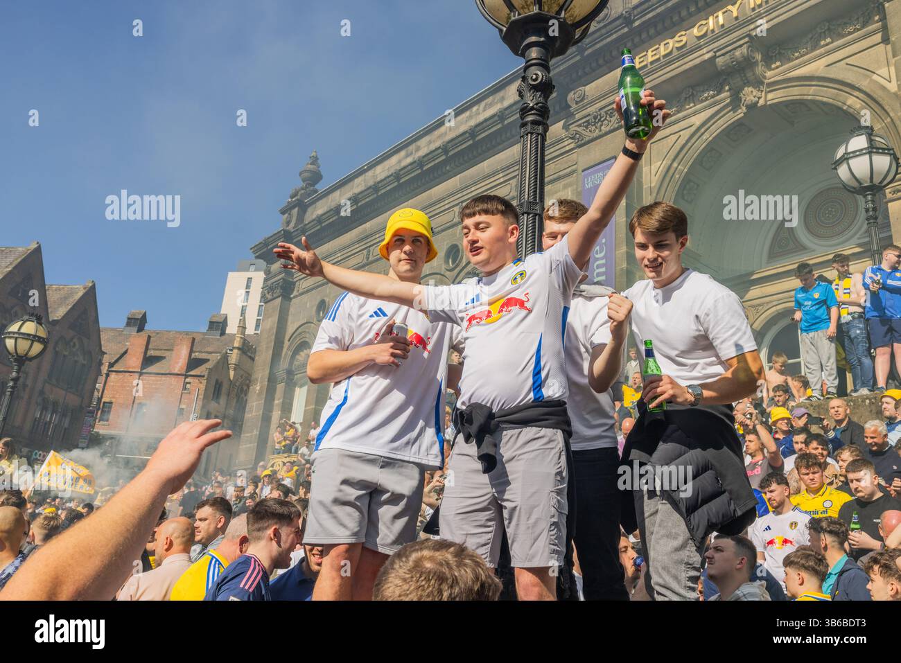 Leeds, UK. 03 MAY, 2025. Leeds United fans celebrate on the steps of ...