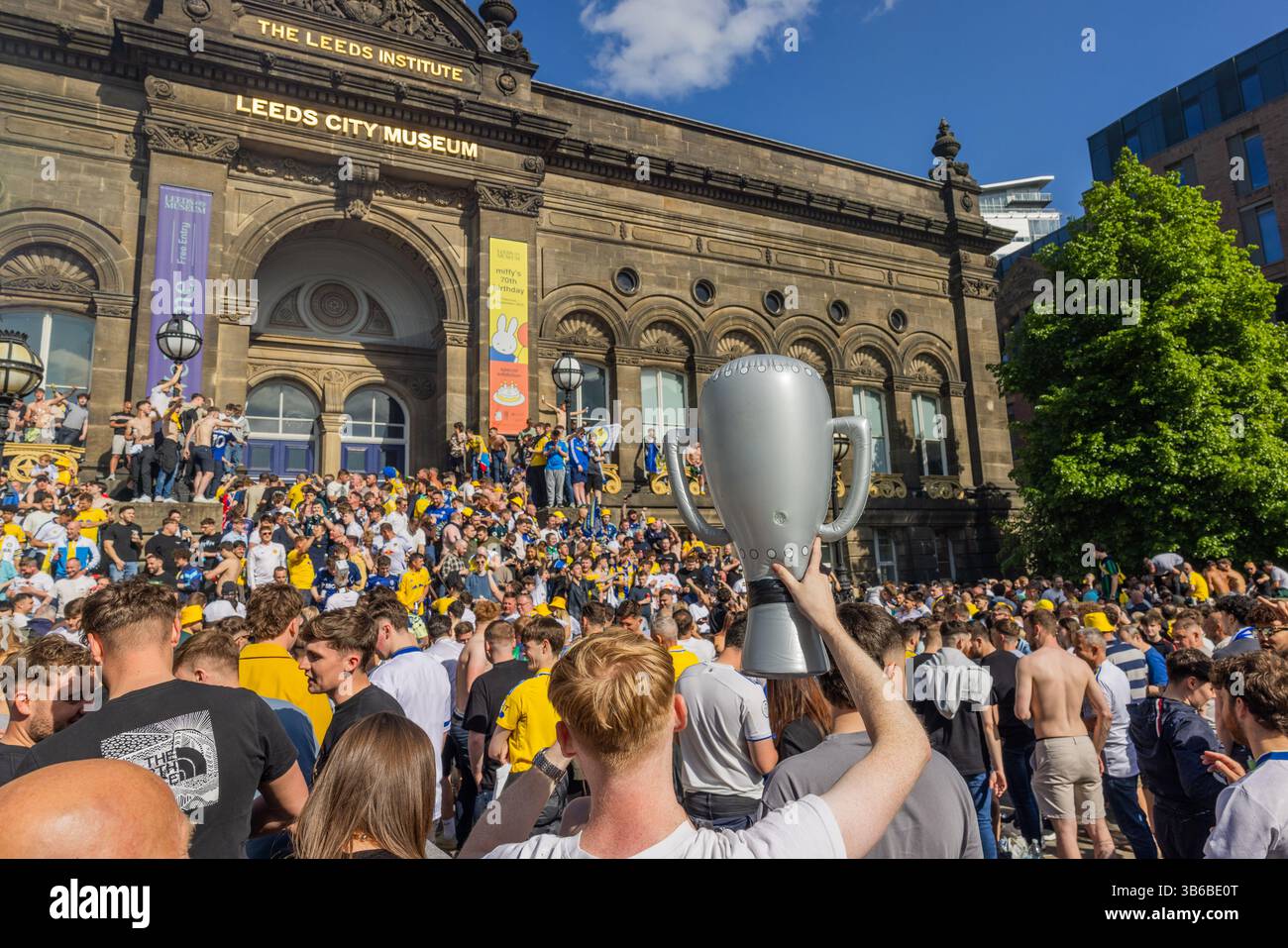 Leeds, UK. 03 MAY, 2025. Man lifts inflatable trophy as Leeds United ...