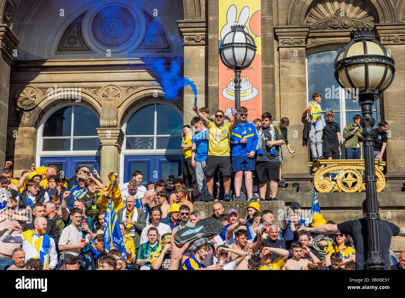 Leeds, UK. 03 MAY, 2025. Leeds United fans celebrate on the steps of ...