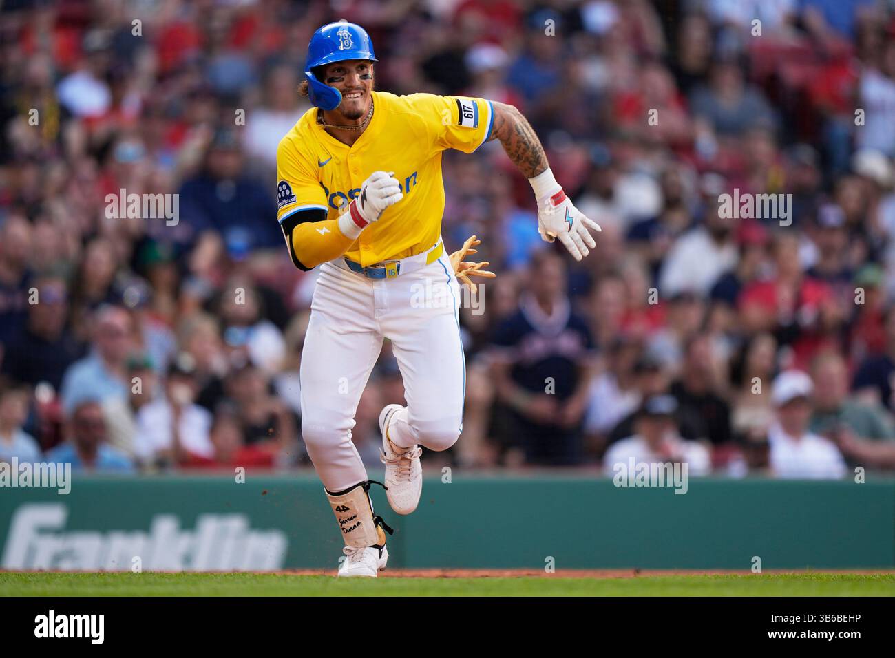 Boston Red Sox's Jarren Duran runs after hitting to right field for a ...