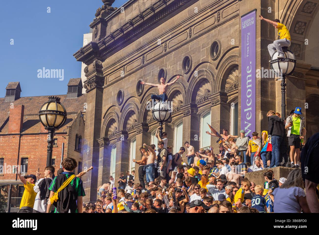 Leeds, UK. 03 MAY, 2025. Leeds United fans celebrate on the steps of ...