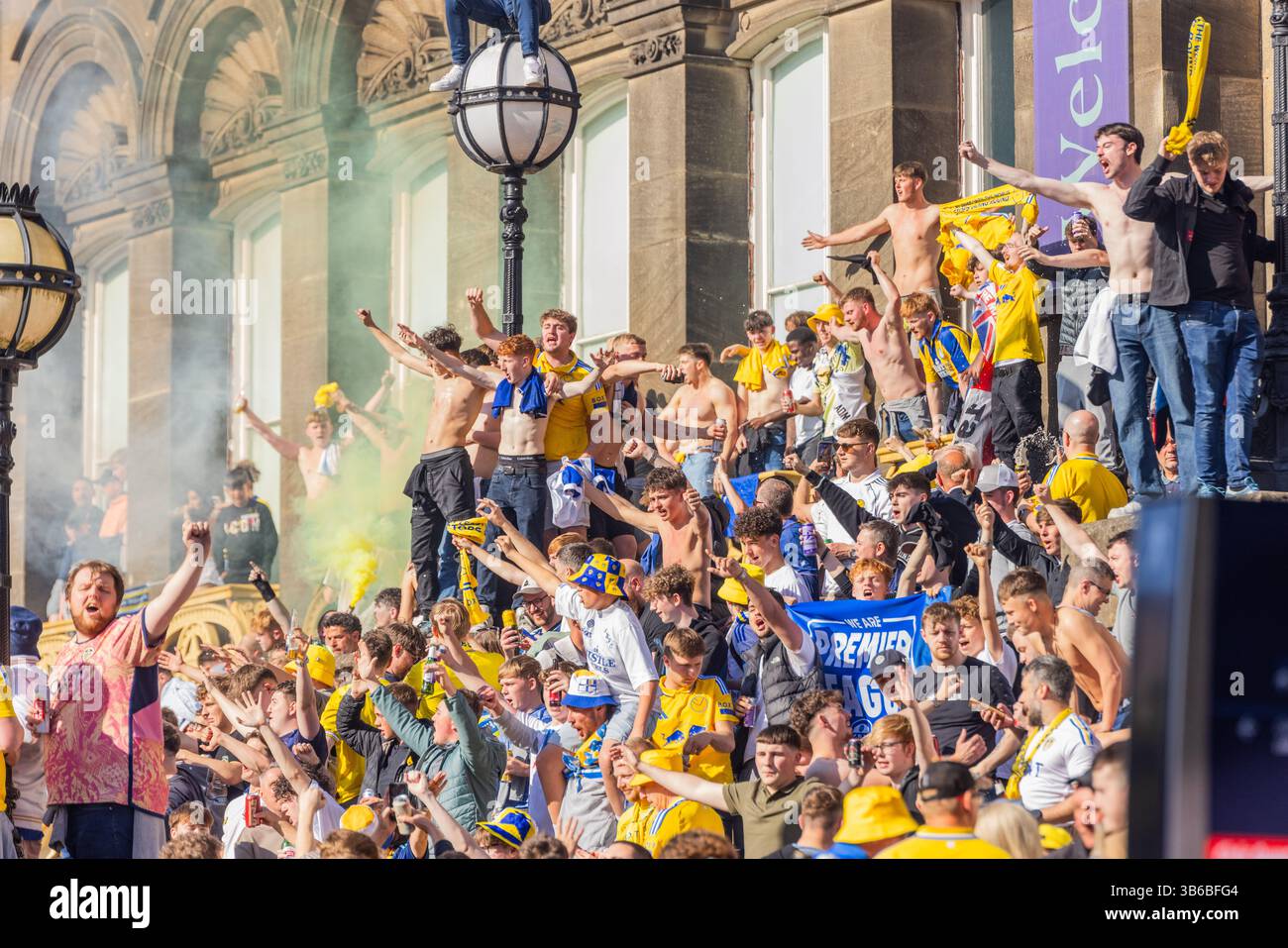 Leeds, UK. 03 MAY, 2025. Leeds United fans celebrate on the steps of ...