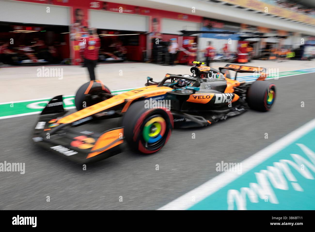 McLaren driver Lando Norris of Britain leaves the pit area during the ...