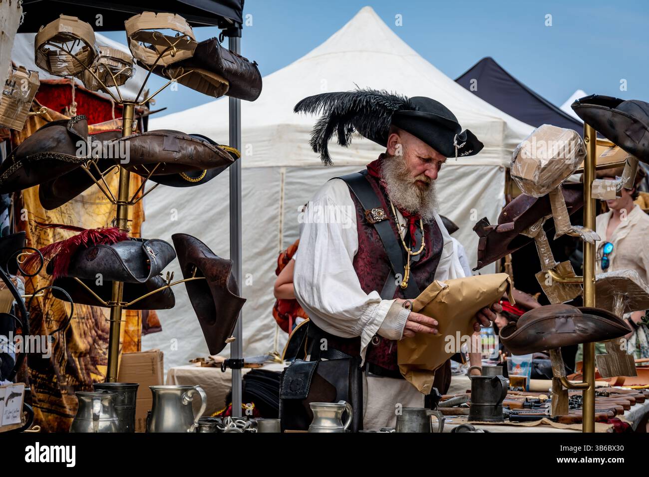 Brixham, UK. 3 May 2025. Costumed pirates fill the harbourside during ...