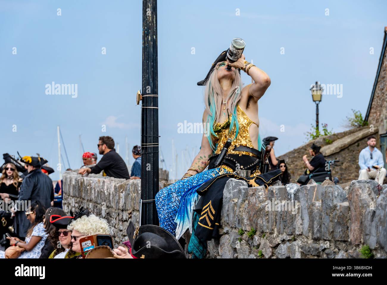 Brixham, UK. 3rd May, 2025. Costumed pirates fill the harbourside ...