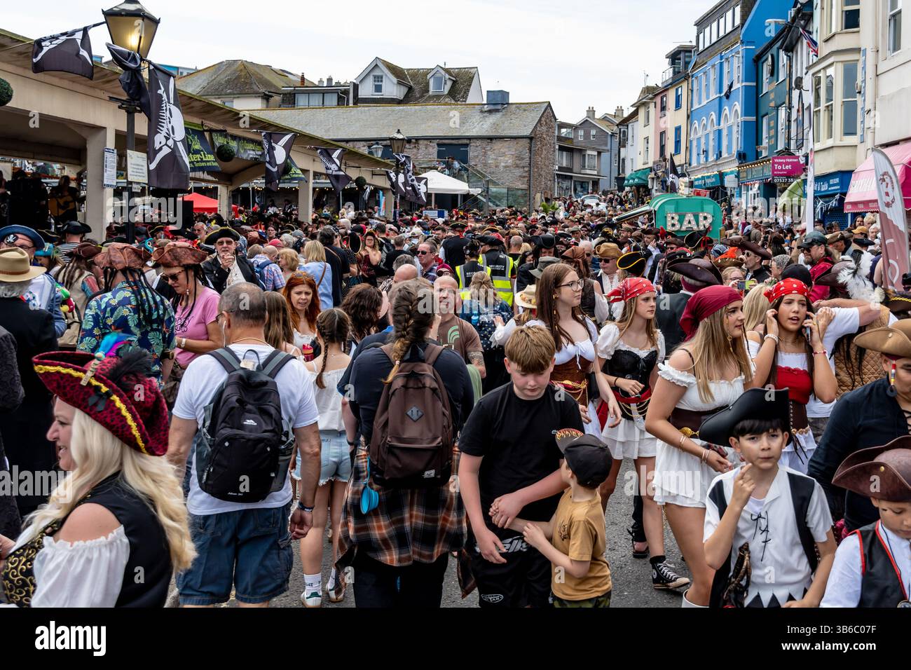 Brixham, UK. 3 May 2025. Costumed pirates fill the harbourside during ...