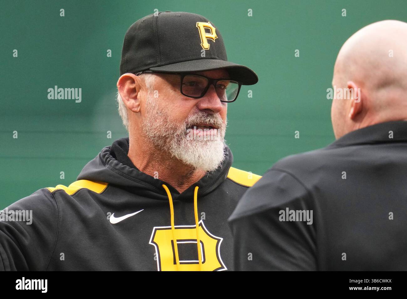 Pittsburgh Pirates manager Derek Shelton, left, talks with umpire Mike ...
