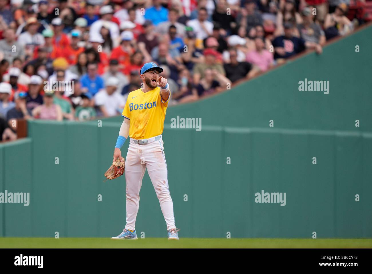Boston Red Sox shortstop Trevor Story gives positioning instructions to ...