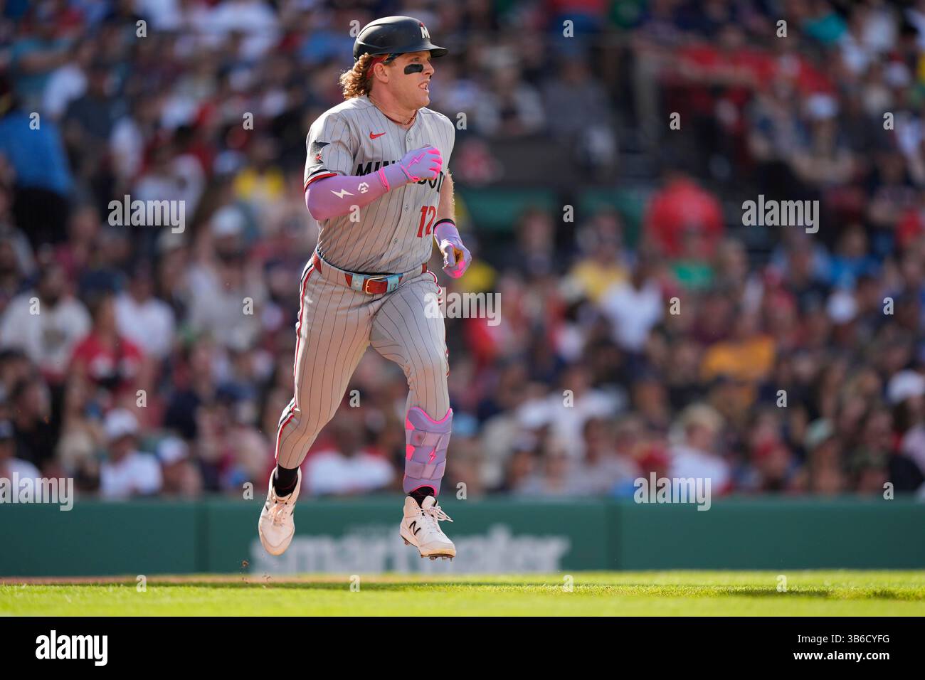Minnesota Twins right fielder Harrison Bader runs out a hit against the ...