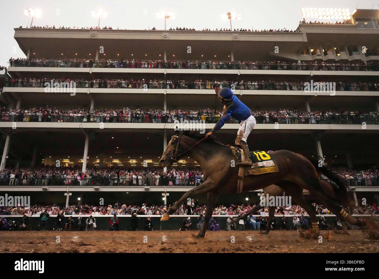 Sovereignty, ridden by Junior Alvarado, crosses the finish line to win ...