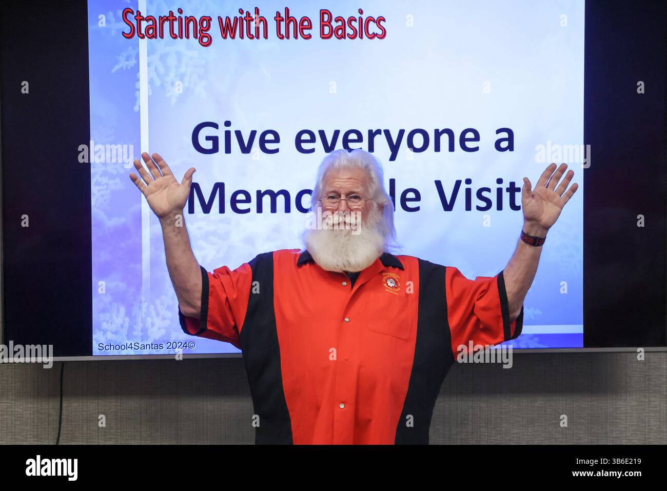 A group of Santas and Mrs. Clauses attend the International University ...