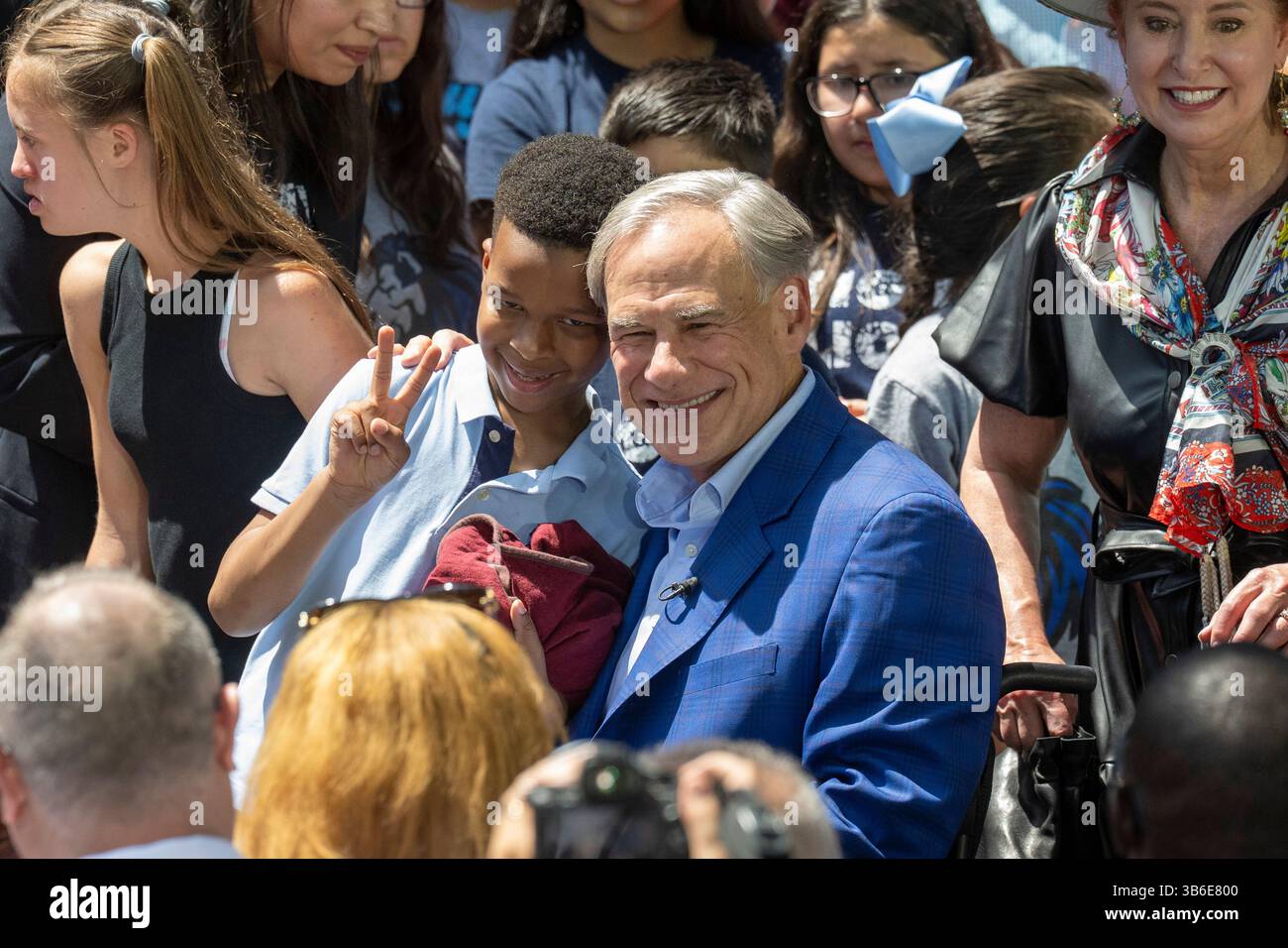 Austin Texas USA, May 3 2025: Texas Governor Greg Abbott poses with a ...