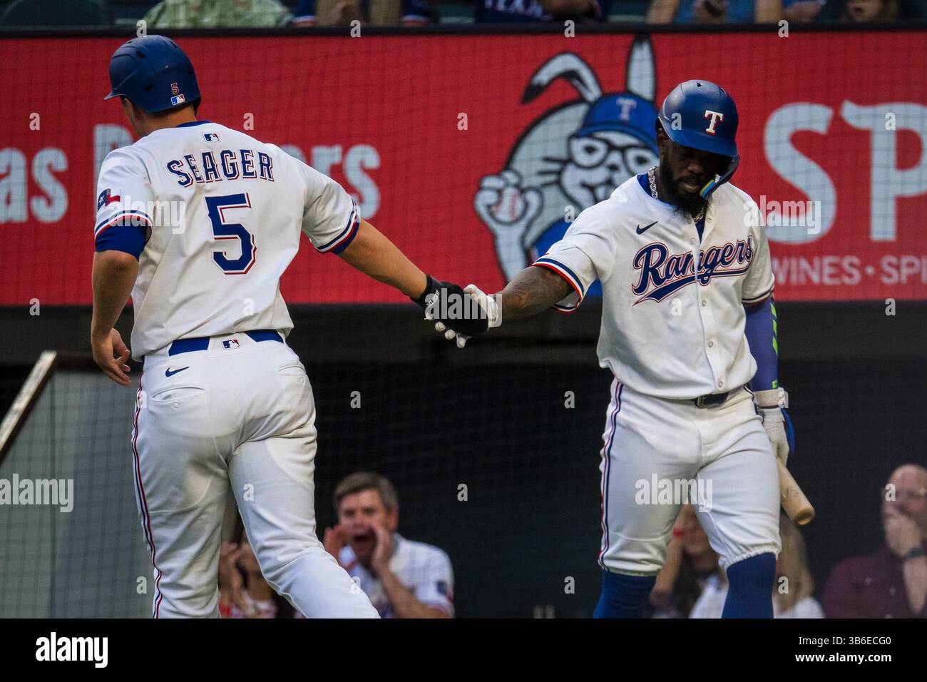 Texas Rangers Corey Seager (5) is congratulated by teammate Adolis ...