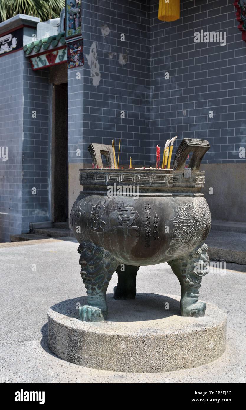 Cast iron three-leg cauldron in front of Tin Hau Temple, Cheung Chau ...