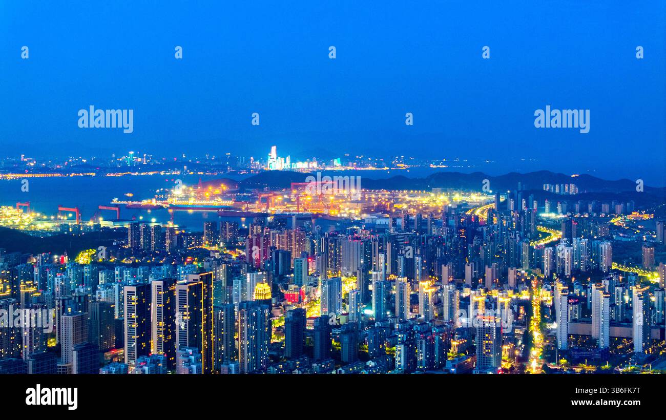 QINGDAO, CHINA - MAY 3, 2025 - Night view of the administrative center ...