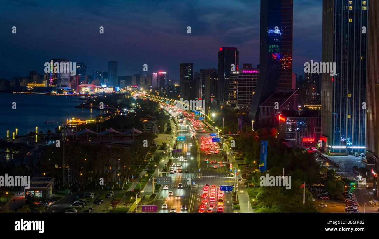 QINGDAO, CHINA - MAY 3, 2025 - Night view of the administrative center ...