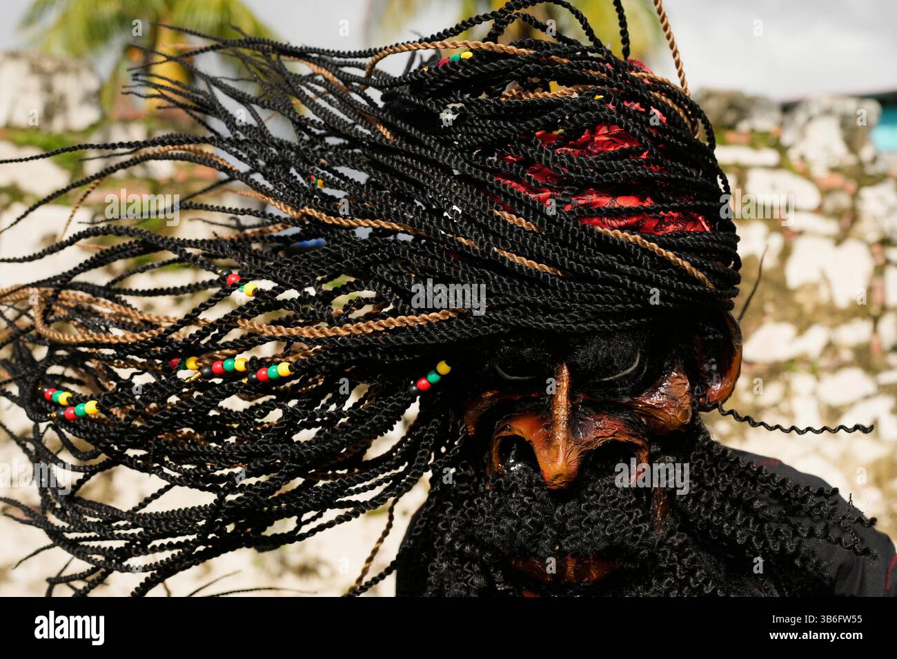 Revelers take part in the Devils and Congos Festival in Portobelo ...