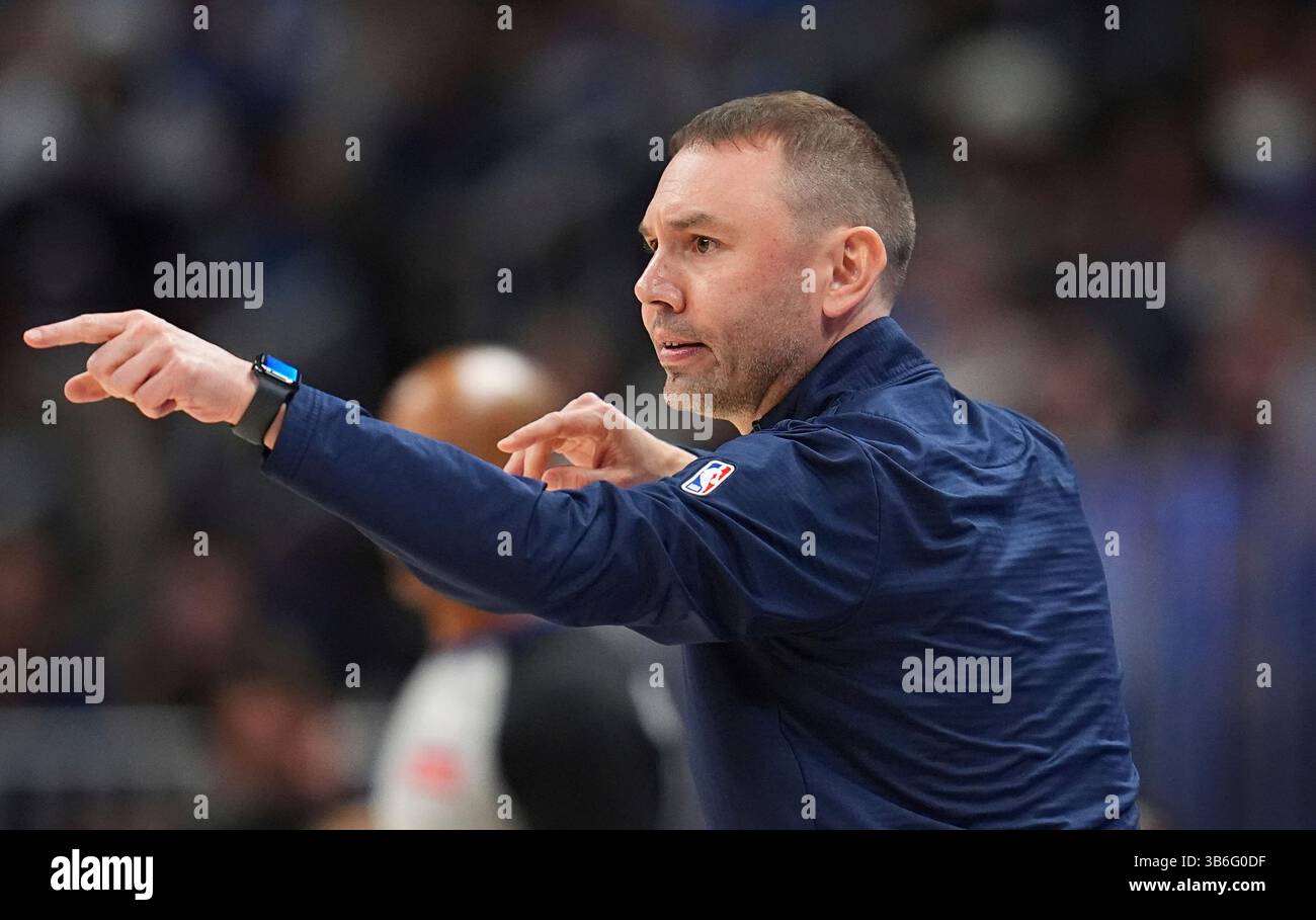 Denver Nuggets head coach David Adelman directs his team against the Los Angeles Clippers in the ...