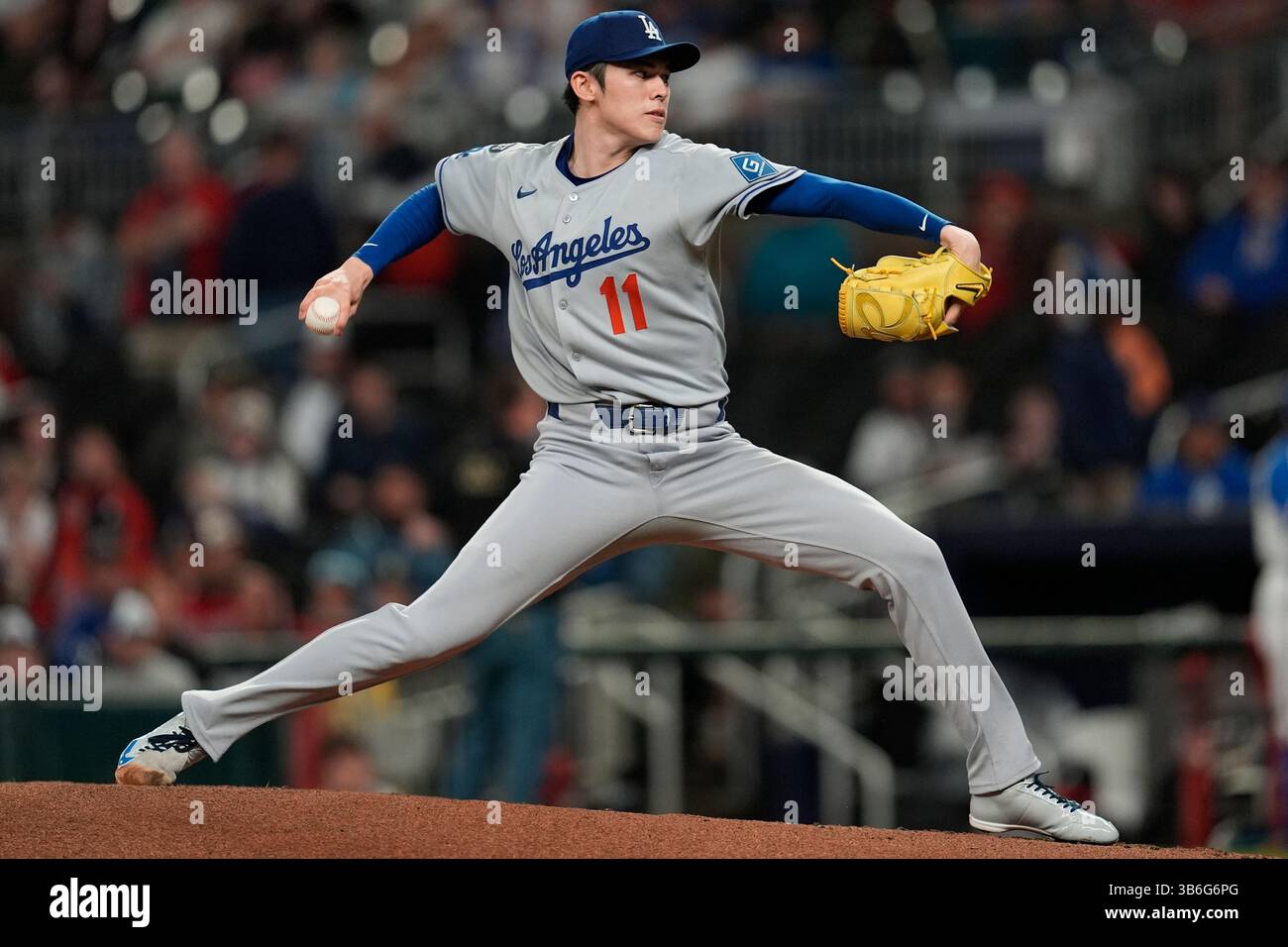 Los Angeles Dodgers pitcher Roki Sasaki (11) delivers against the ...