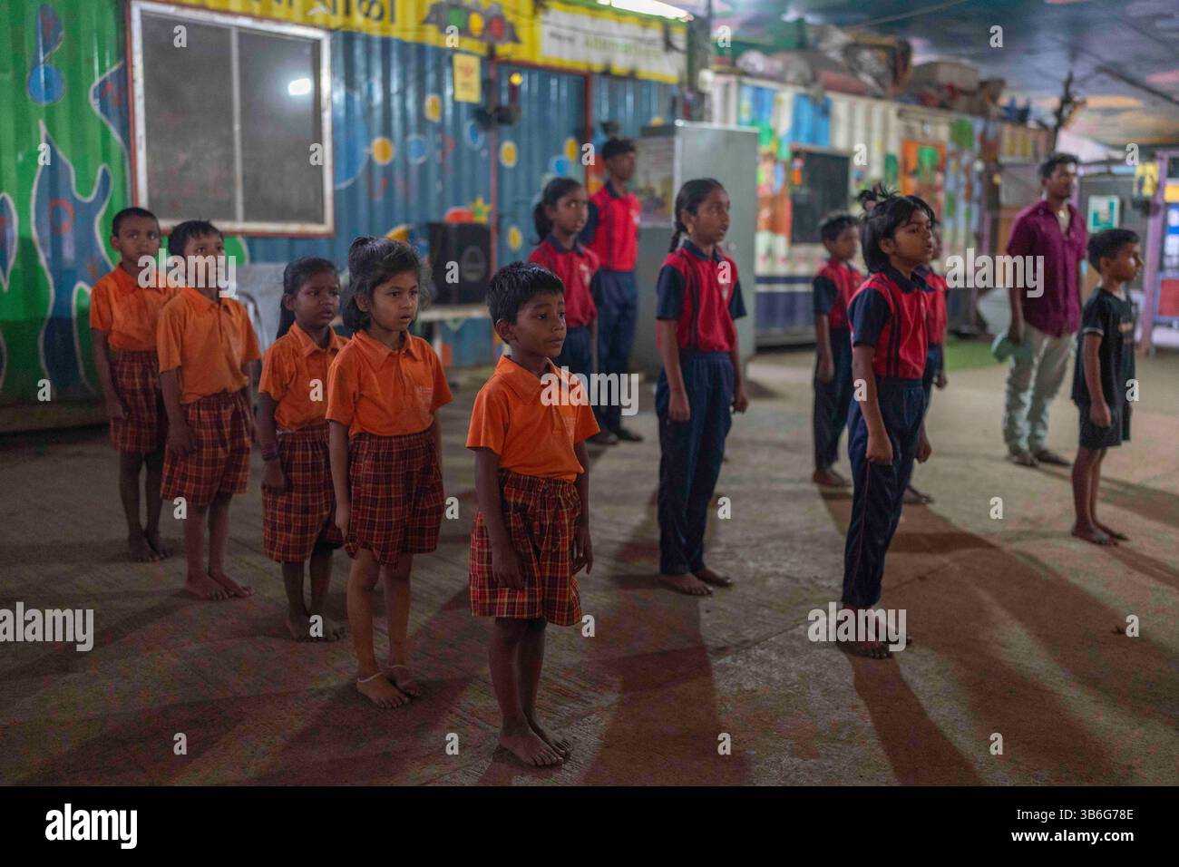 Students sing the Indian national anthem at the Signal Shala school in ...