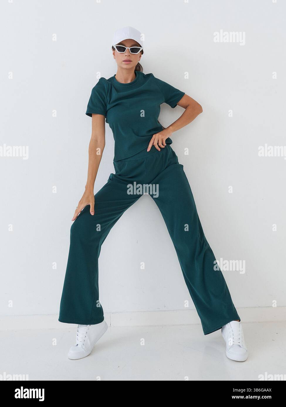 Stunning female model showcases contemporary fashion in a stylish ...