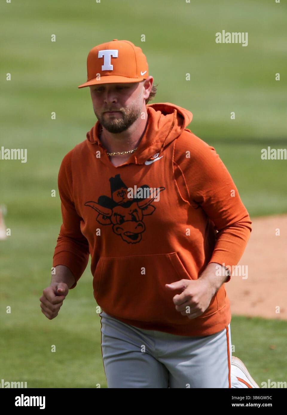 May 3, 2025: Texas Assistant Coach Max Weiner makes his way back over ...