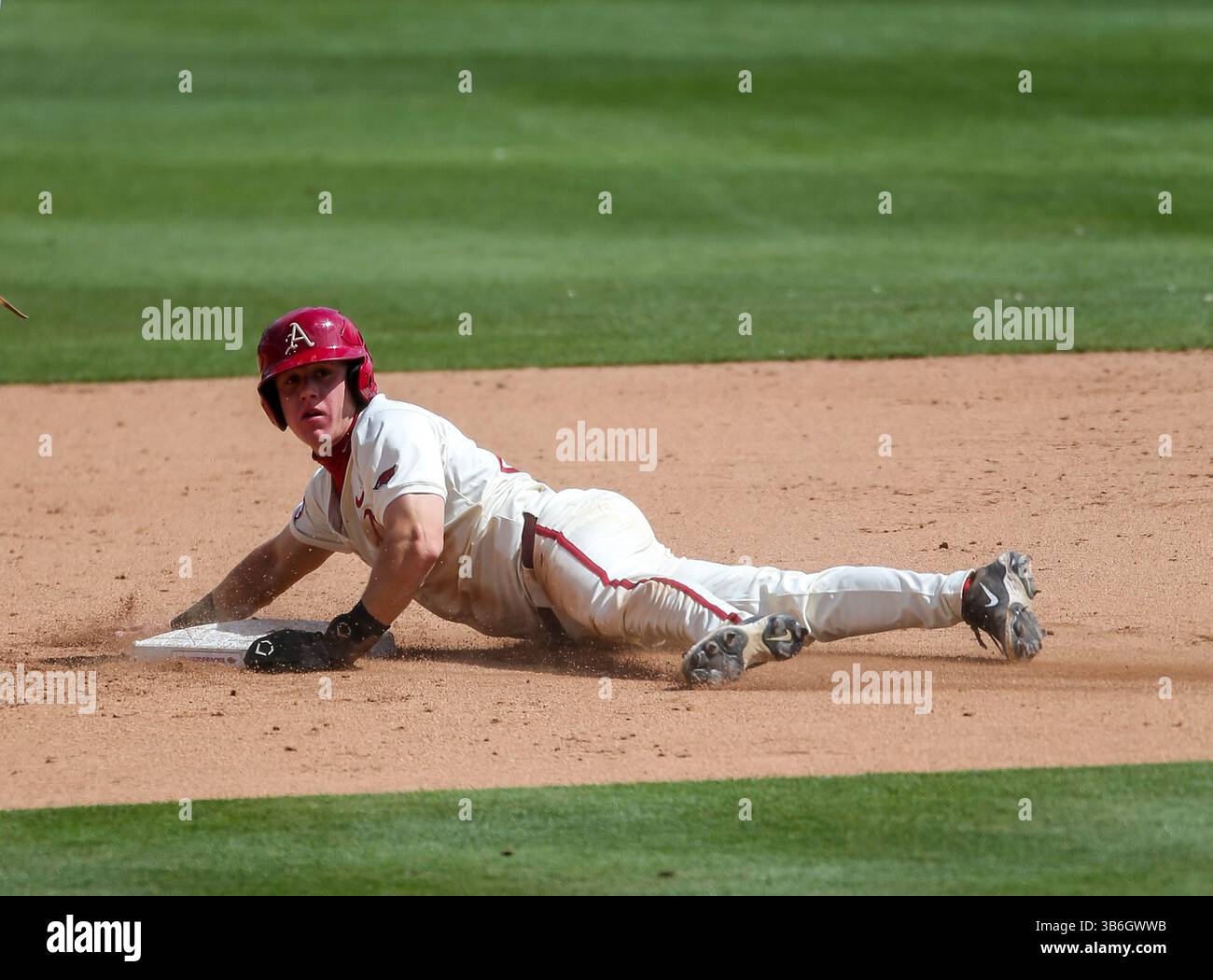 May 3, 2025: Charles Davalan (24) of Arkansas looks back towards the ...