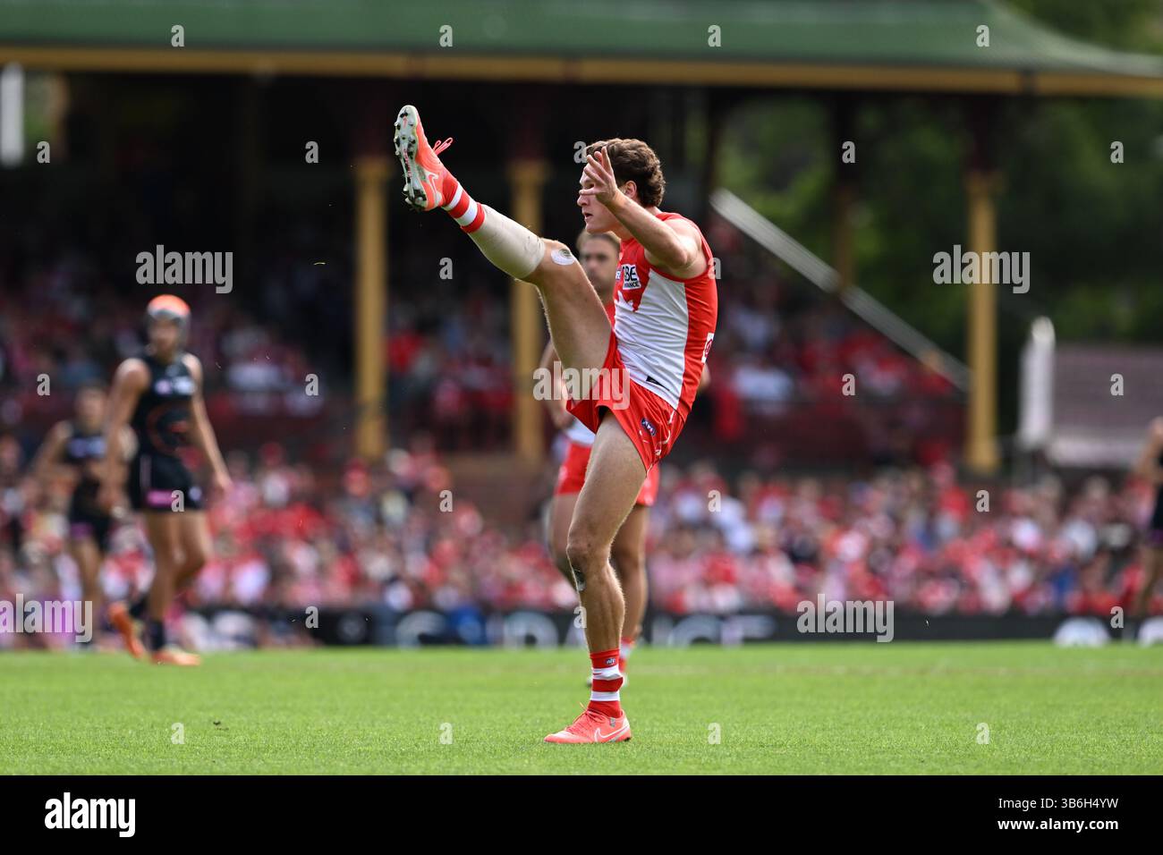 Sydney, Australia. 04th May, 2025. Hayden McLean of the Swans kicks a ...