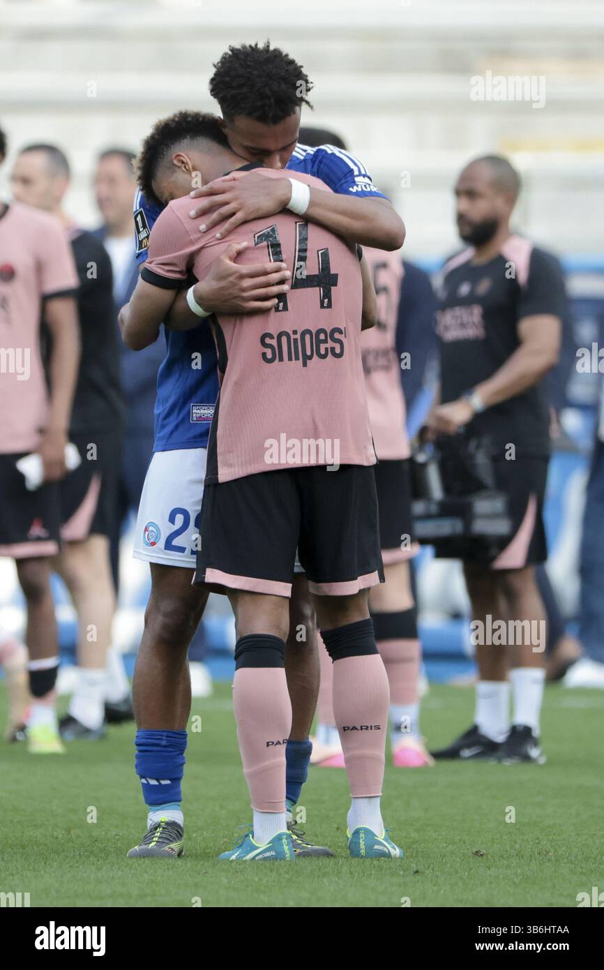 Guela Doue of Strasbourg and his brother Desire Doue of PSG following ...