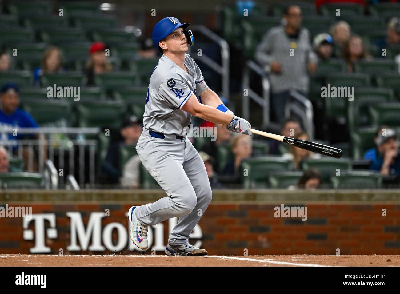 ATLANTA, GA – MAY 03: Los Angeles catcher Will Smith (16) hits the ball ...