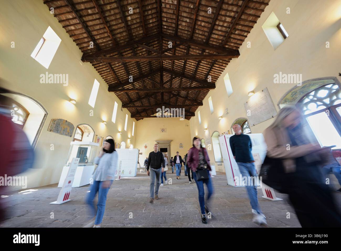 Tourists visit the Palace of the Popes' hall that hosted the longest ...