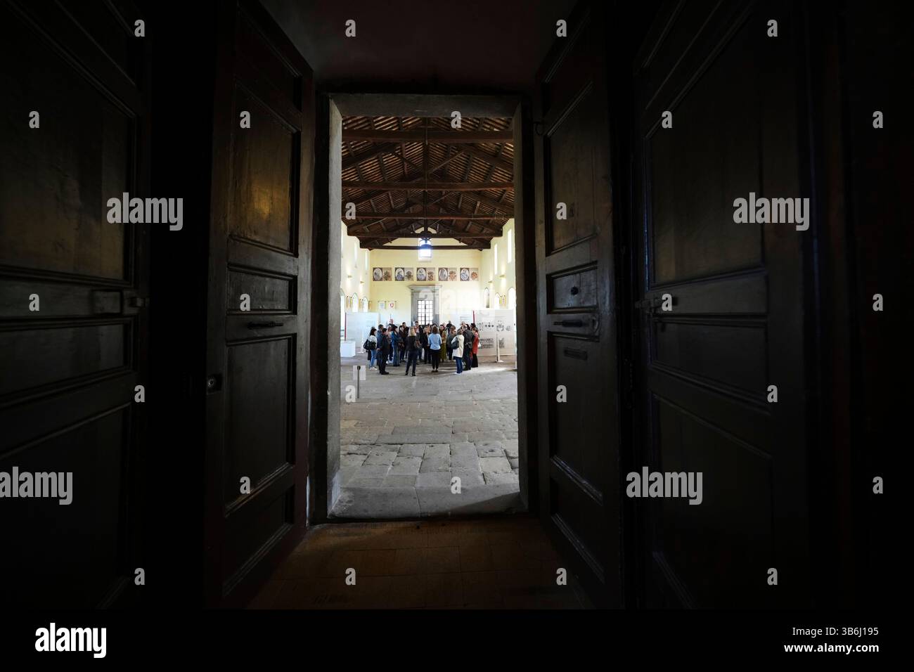 Tourists visit the Palace of the Popes' hall that hosted the longest ...