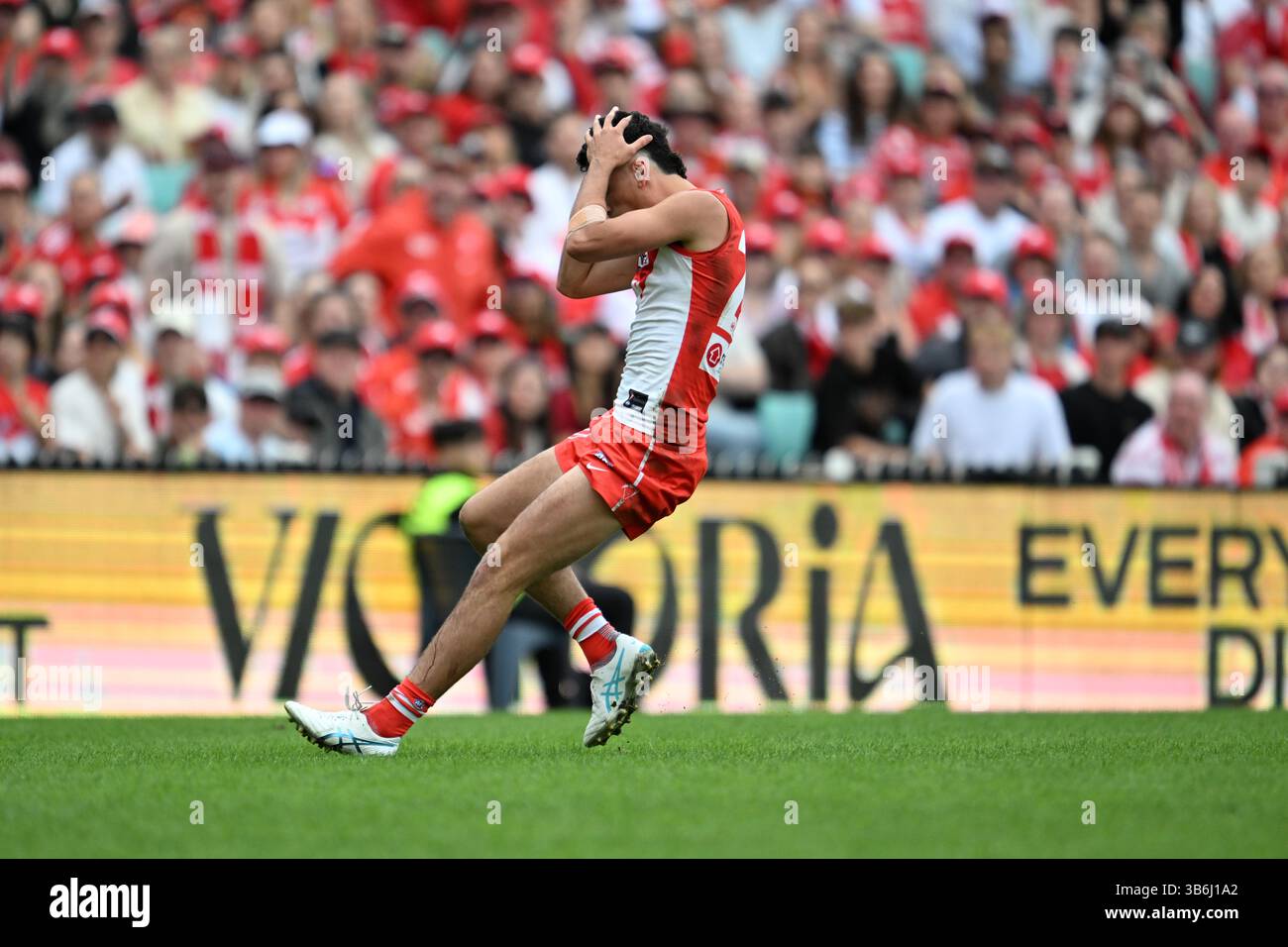 Justin McInerney of the Swans reacts after a missed kick at goal during ...