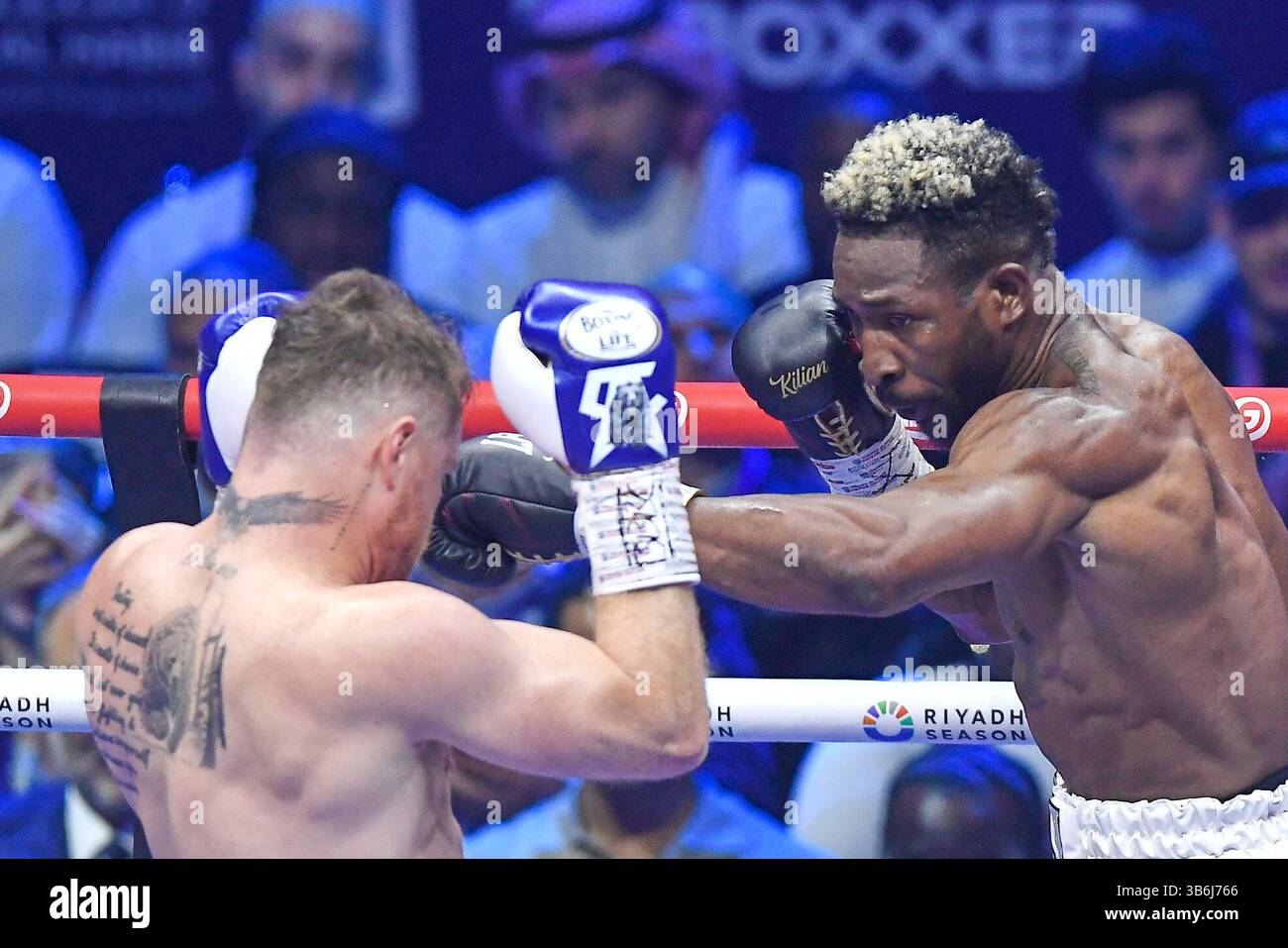 William Scull, right, punches Saul Canelo Alvarez during super ...