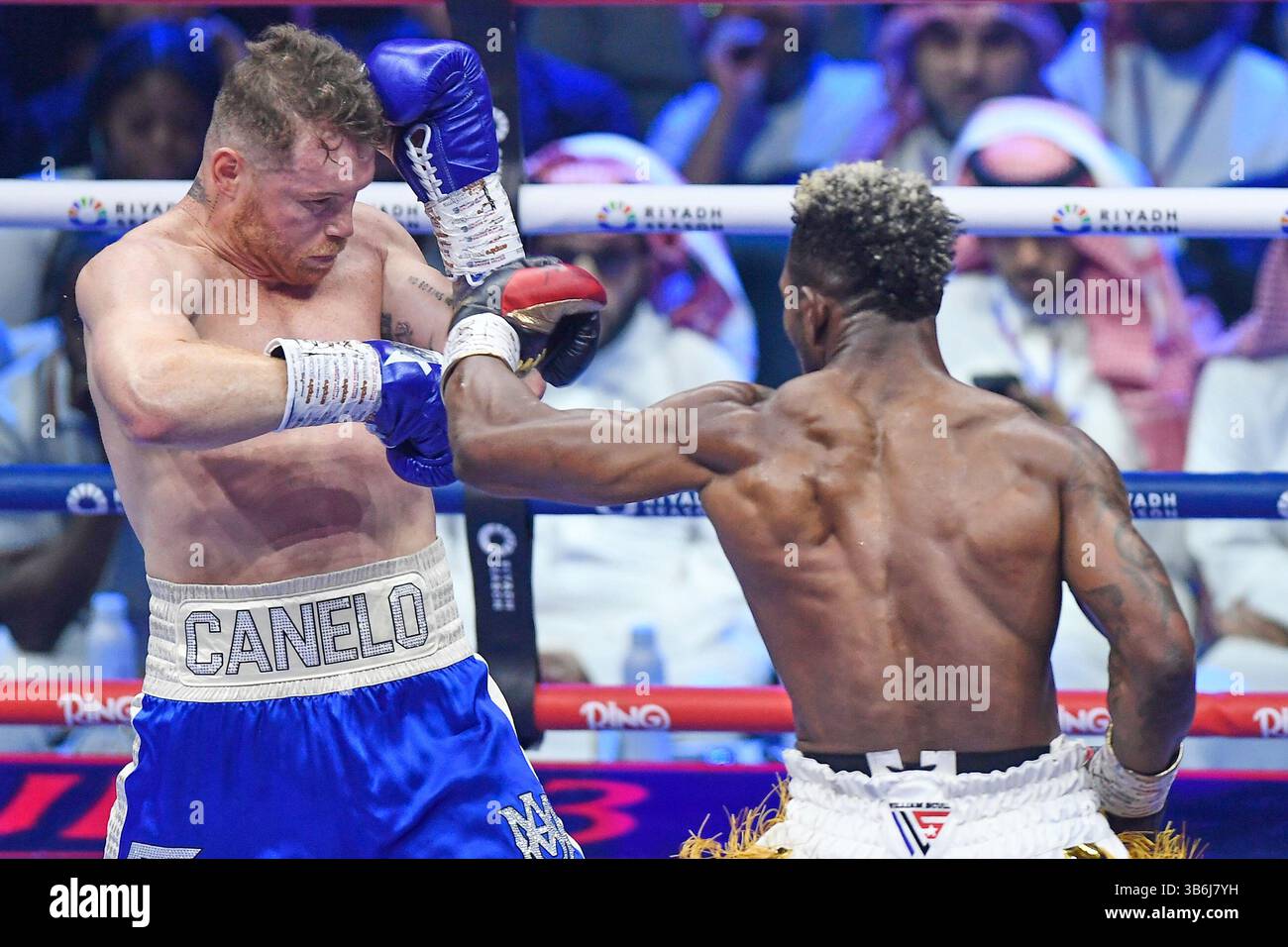 William Scull, right, and Saul Canelo Alvarez fight during super ...