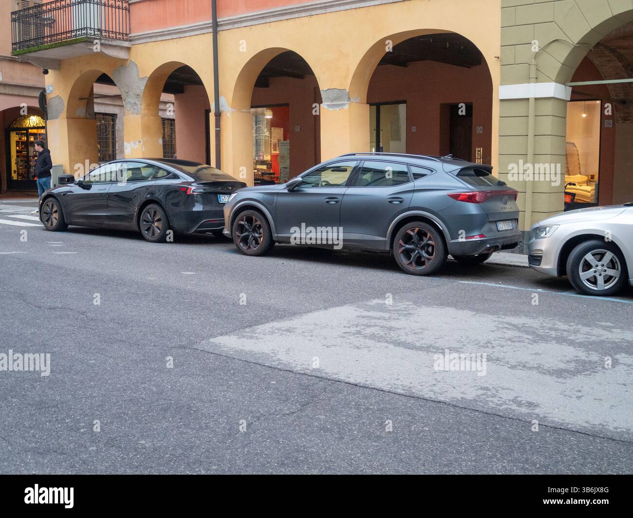 Cremona, Italy - April 12th 2025 Cupra Formentor and black Tesla Model ...