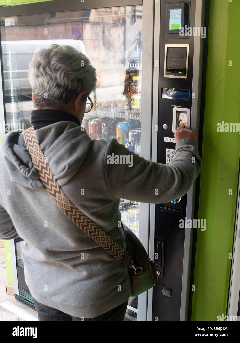 Cremona, Italy - April 12th 2025 Customer Interacting with a Modern ...