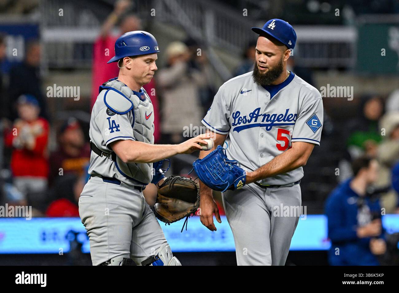 ATLANTA, GA – MAY 03: Los Angeles catcher Will Smith (16) congratulates ...