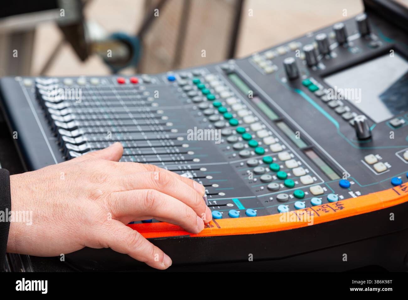 Remote control adjusting sound music hi-res stock photography and ...