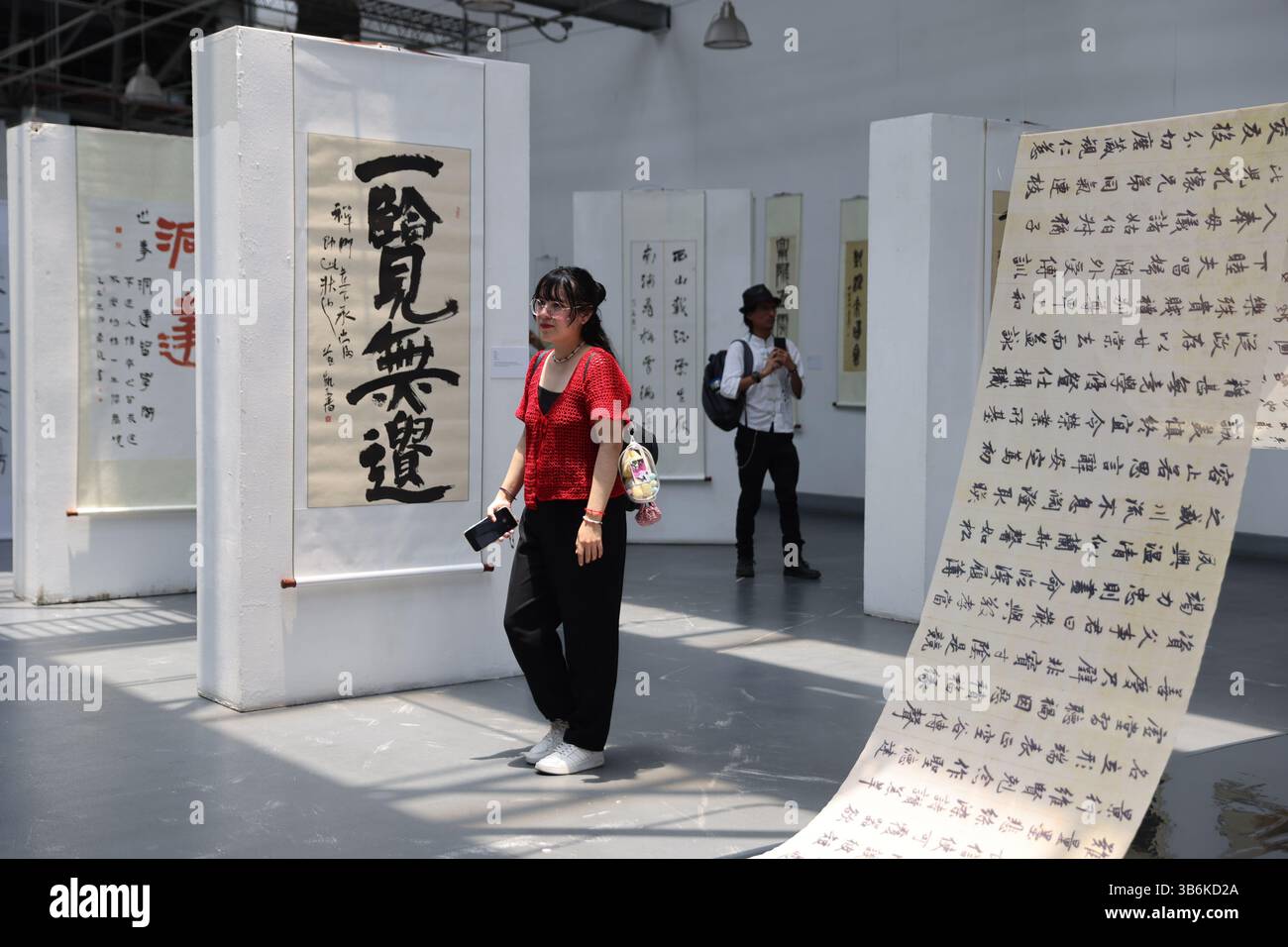 Mexico City, Mexico. 3rd May, 2025. Visitors admire calligraphy works ...