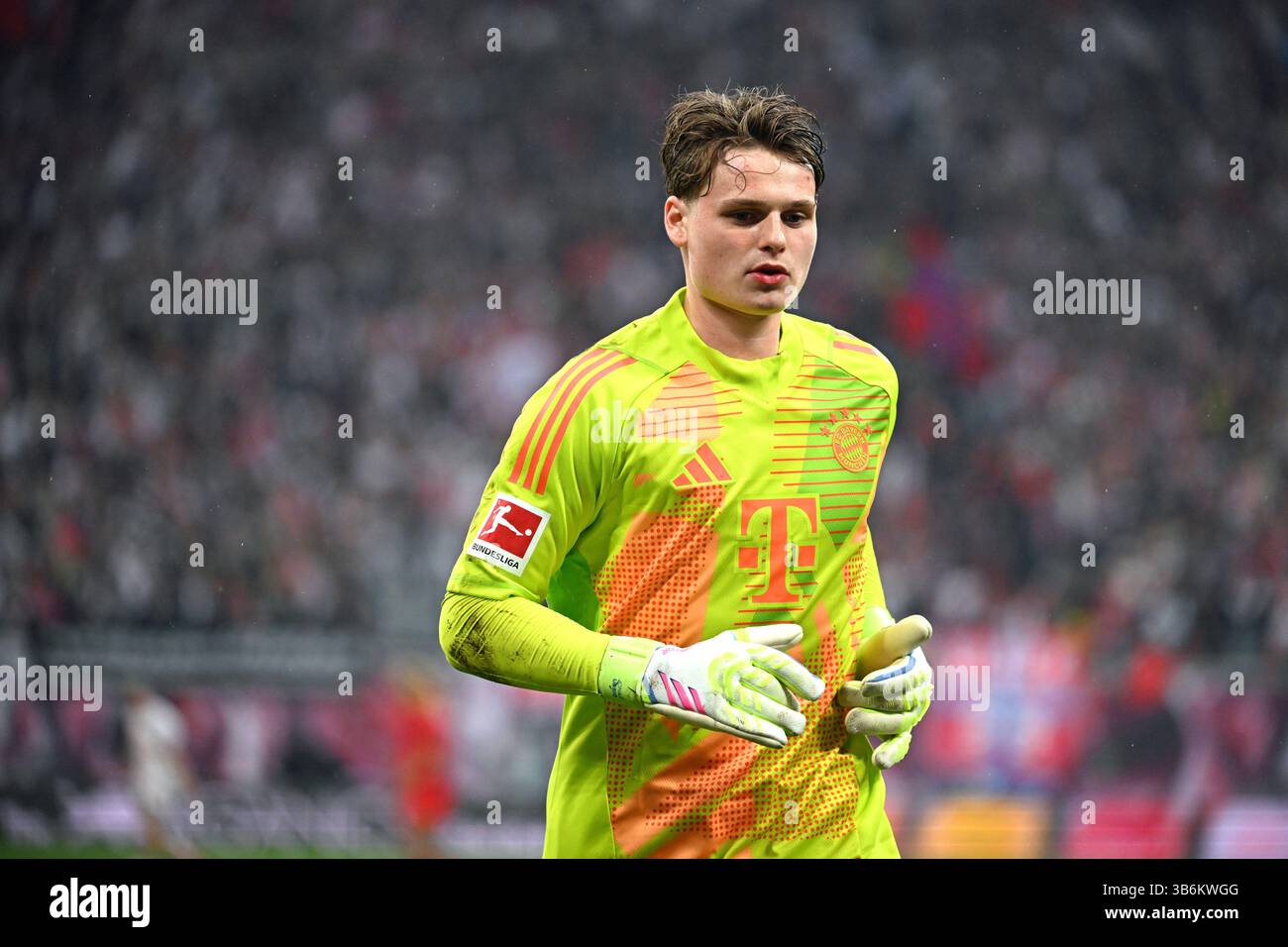 03 May 2025, Saxony, Leipzig: Goalkeeper Jonas Urbig runs across the ...