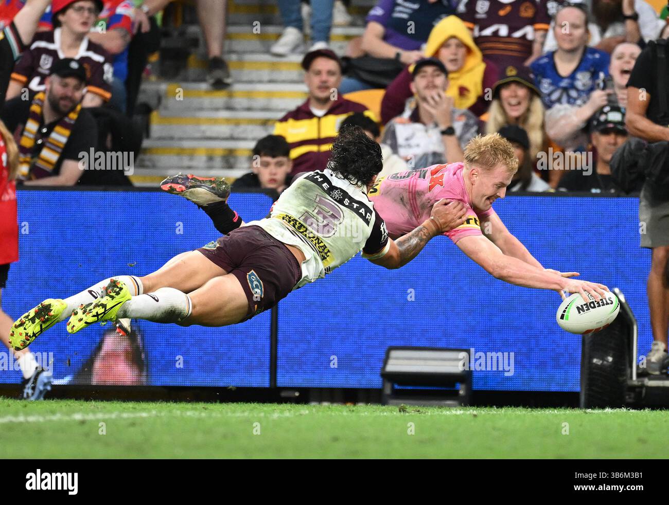 Brisbane, Australia. 04th May, 2025. Thomas Jenkins of the Panthers scores a try during the NRL ...