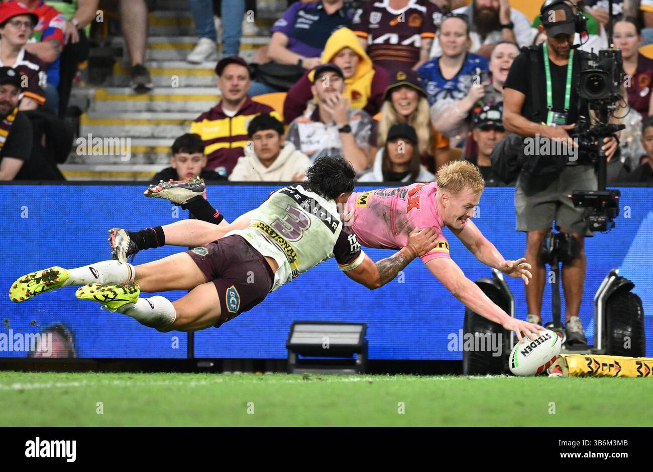 Brisbane, Australia. 04th May, 2025. Thomas Jenkins of the Panthers scores a try during the NRL ...